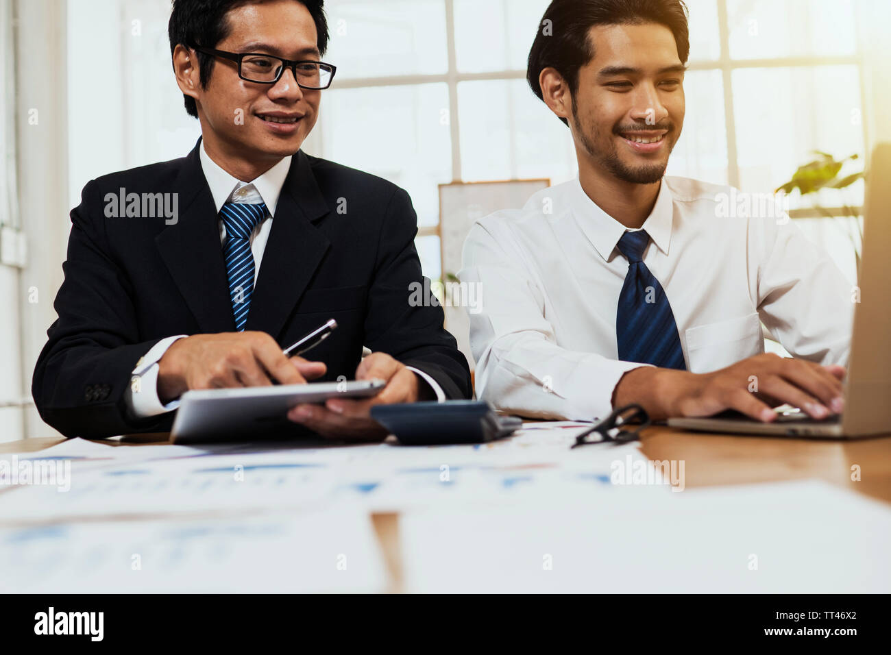 Business financial team planning and discussing marketing on table with ...