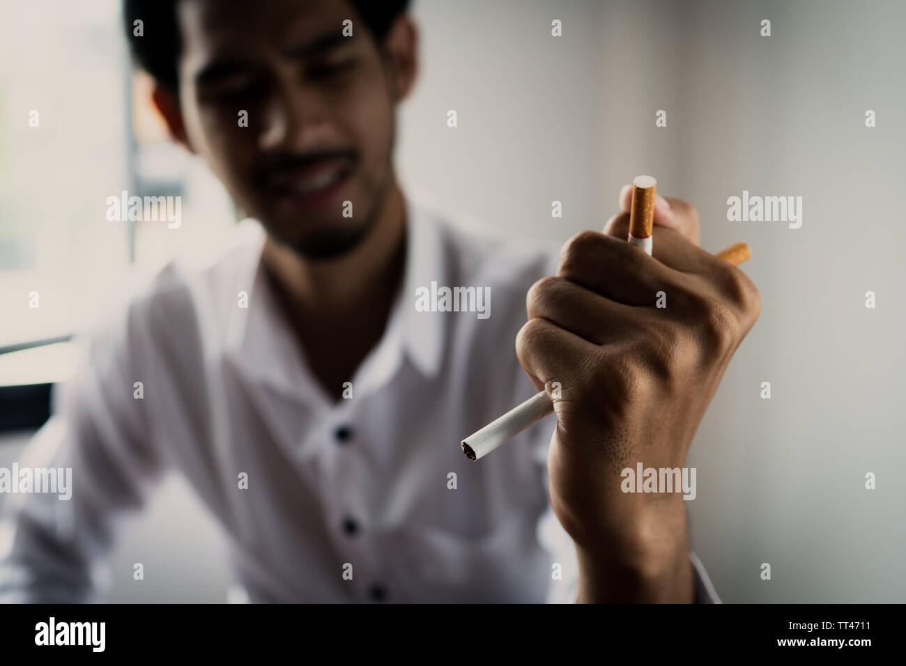 World No Tobacco Day in May, stop smoking concept, young man against ...