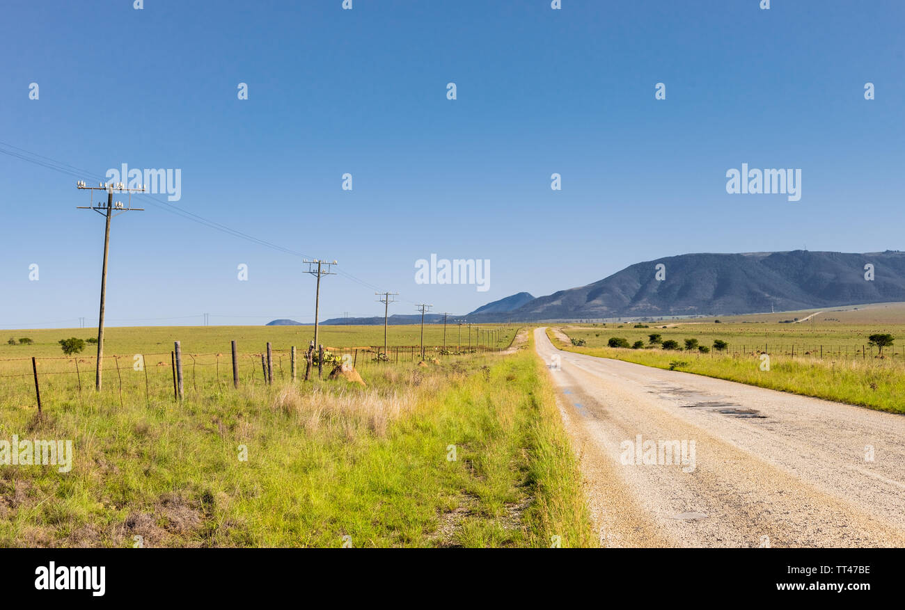 View of an empty country highway road in South African Farmland region ...