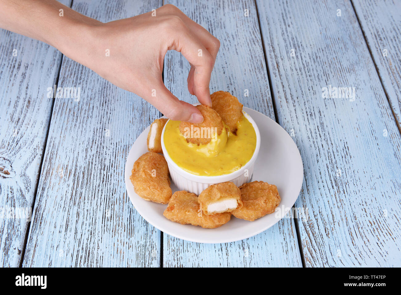 Chicken nuggets dunk hi-res stock photography and images - Alamy