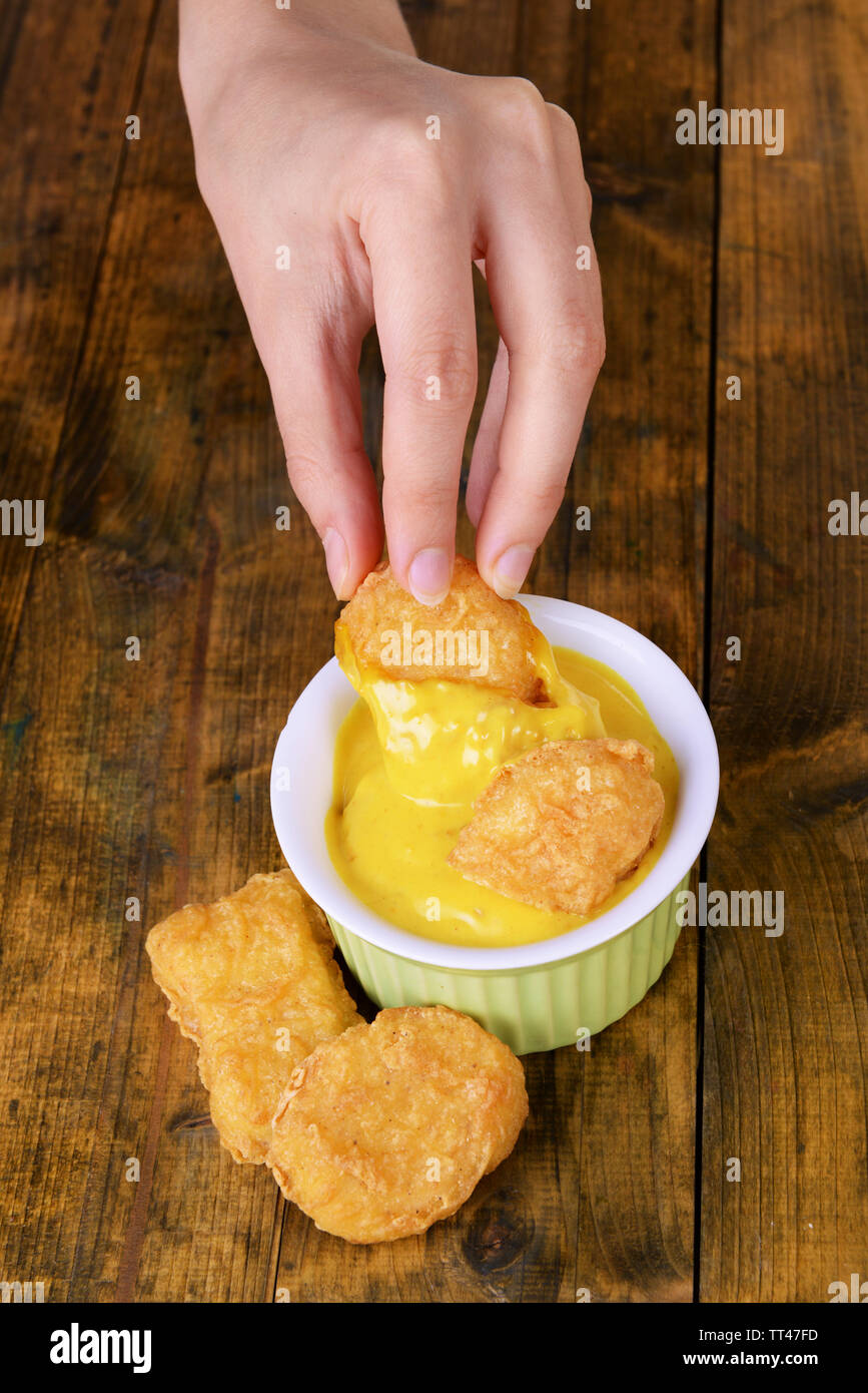 Chicken nuggets dunk hi-res stock photography and images - Alamy