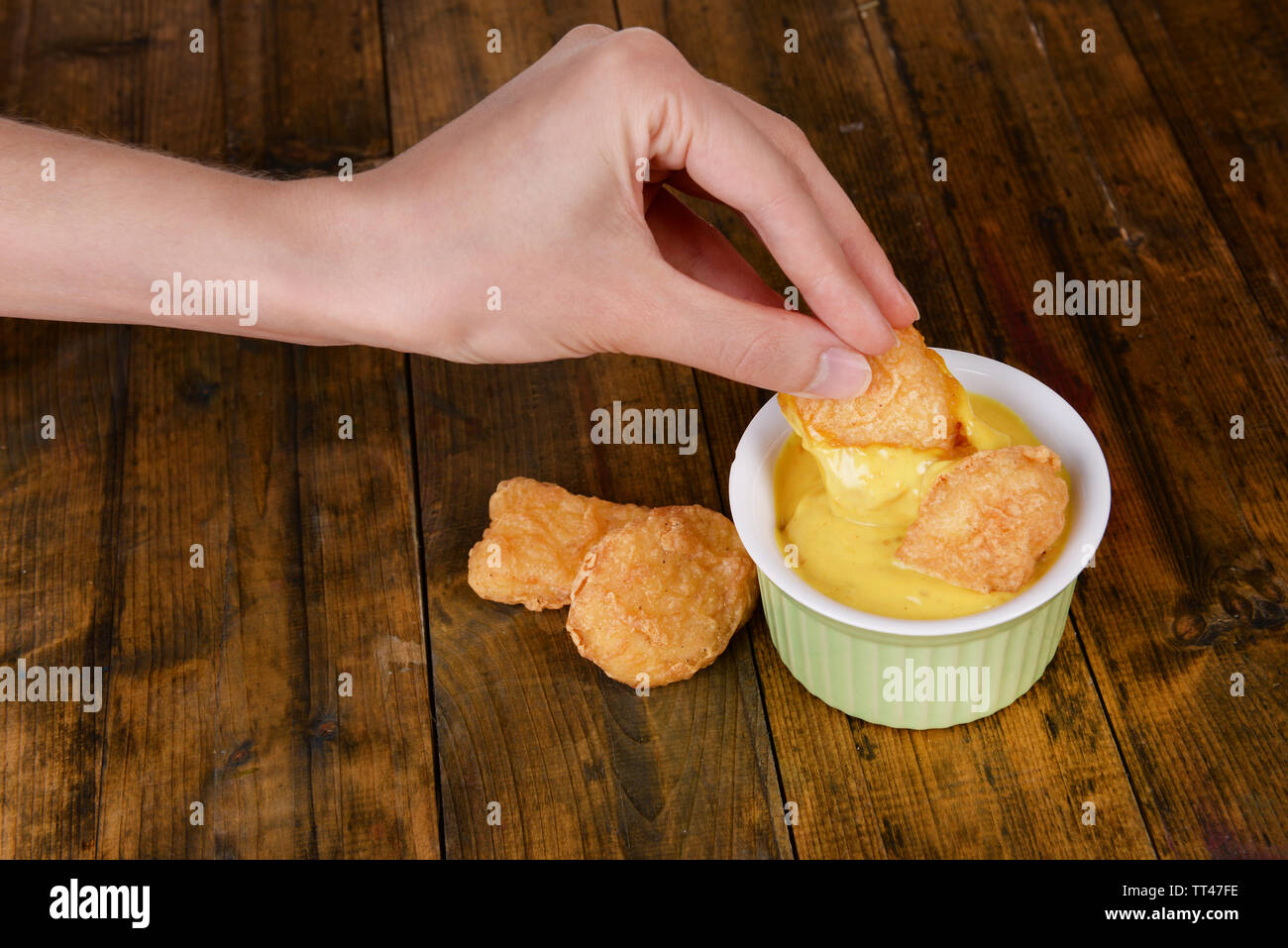 Chicken nuggets dunk hi-res stock photography and images - Alamy