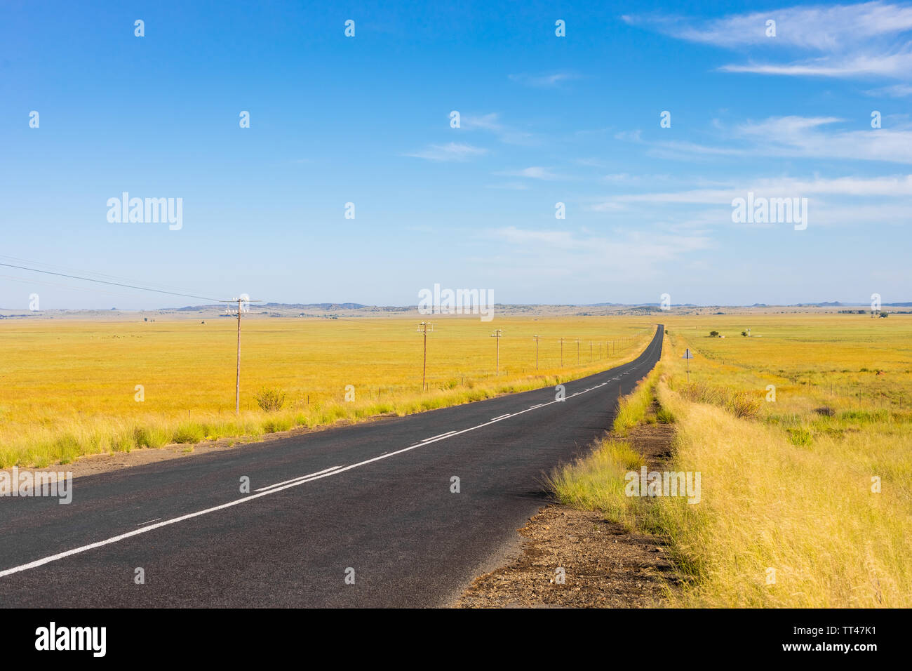 View of an empty country highway road in South African Farmland region ...