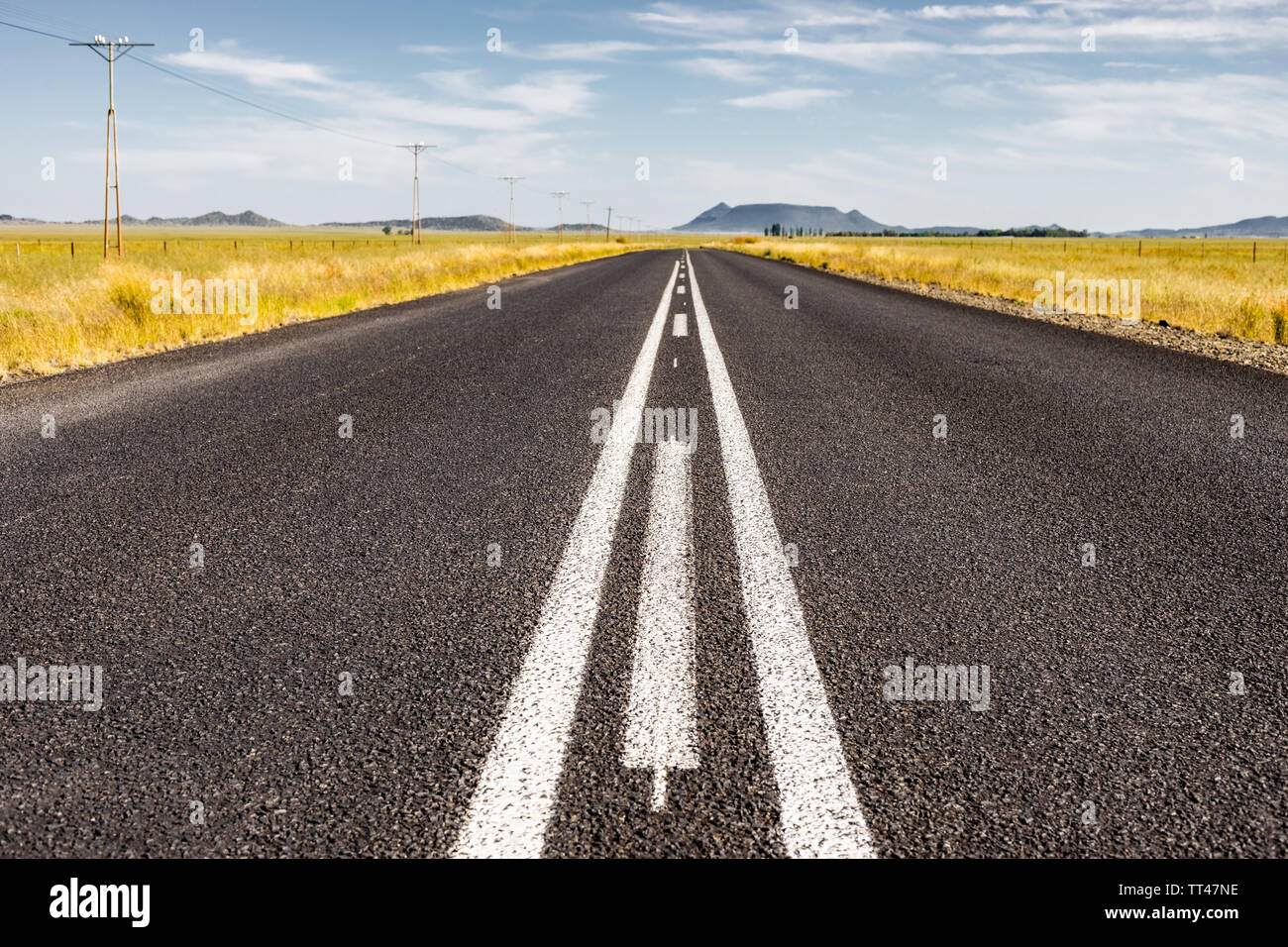 View of an empty country highway road in South African Farmland region ...