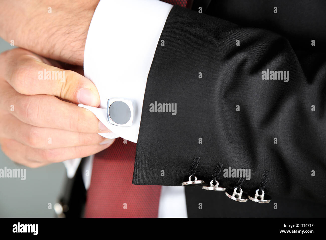Doing up collar hi-res stock photography and images - Alamy
