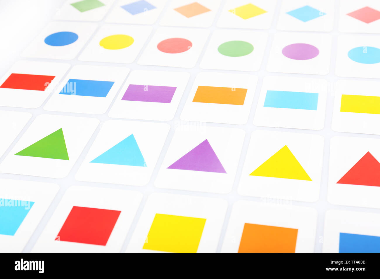 Educational cards with color geometric shapes, close up Stock Photo - Alamy
