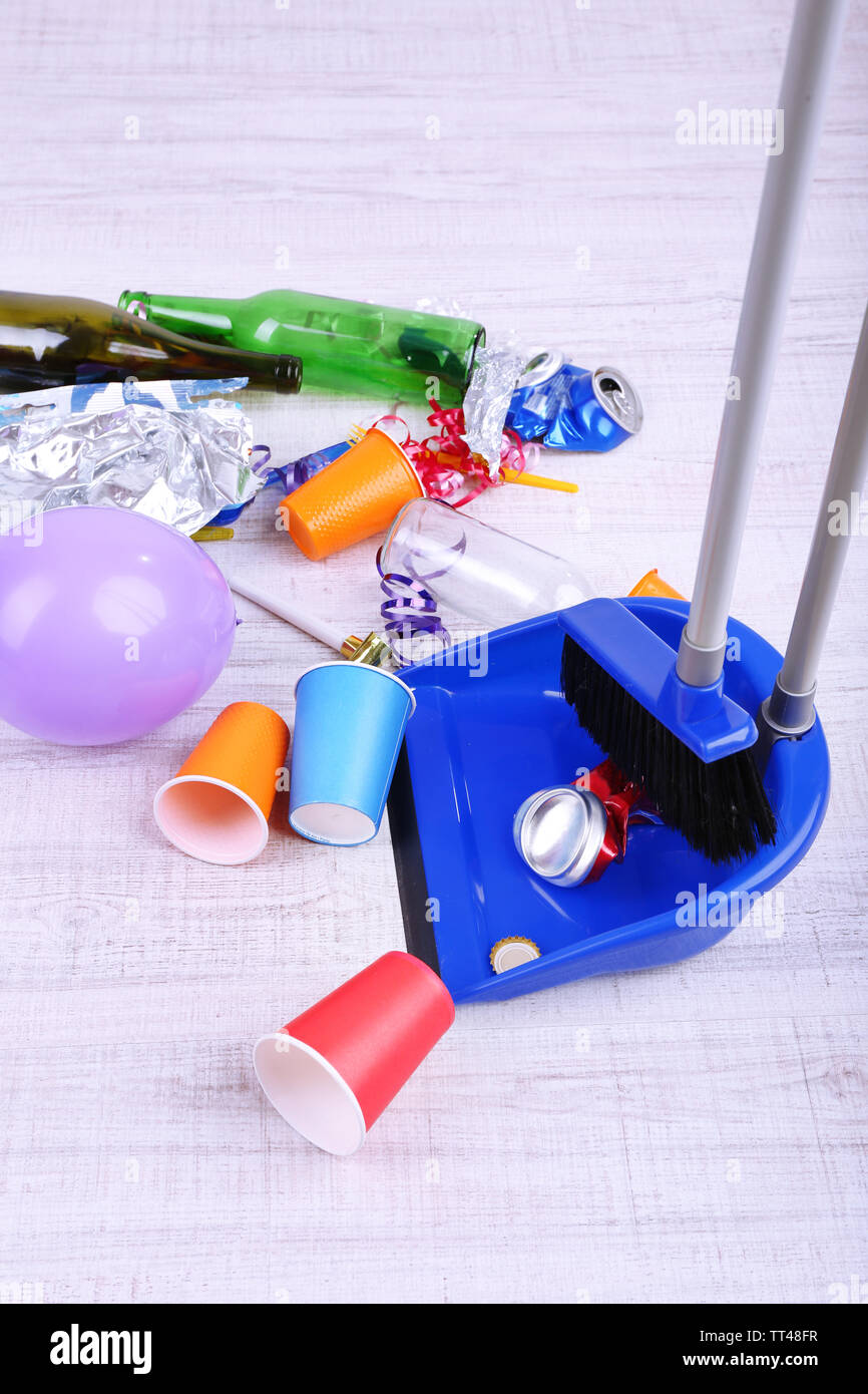 Heap of mess on grey wooden floor Stock Photo - Alamy