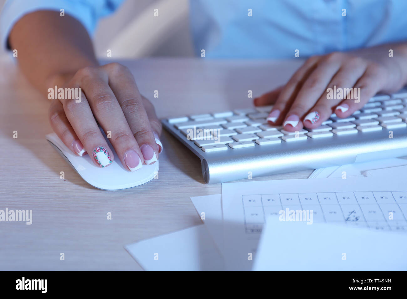 Female hand holding computer mouse, close-up Stock Photo - Alamy