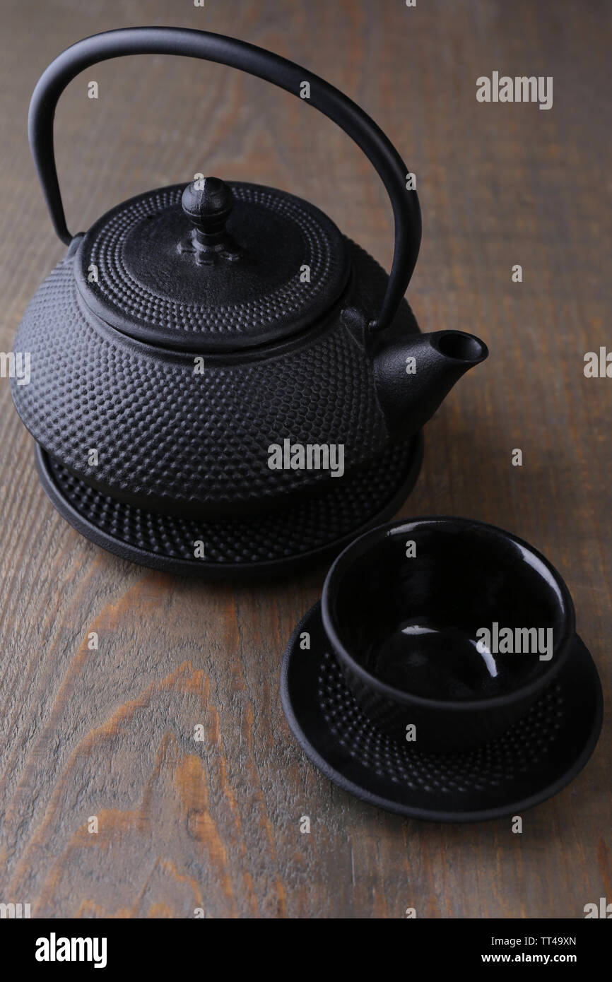 Chinese traditional teapot on wooden background Stock Photo - Alamy