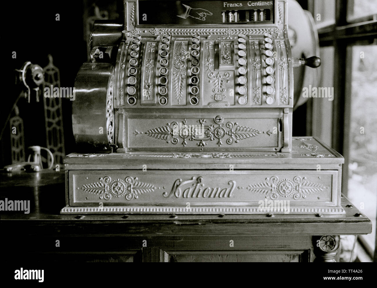 Old fashioned cash machine in a flea market in Bangkok in Thailand in ...