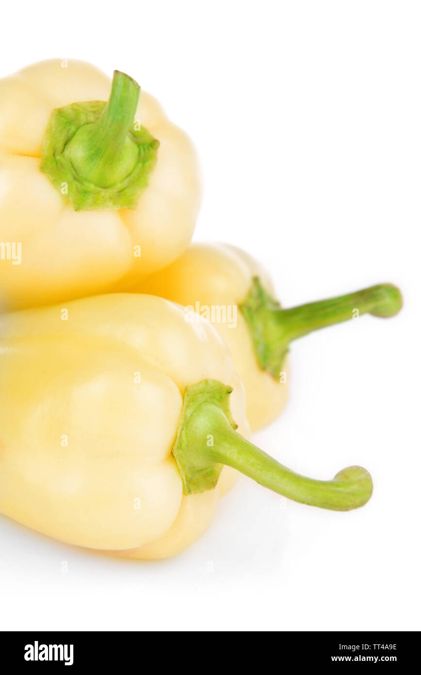 Yellow peppers isolated on white Stock Photo - Alamy
