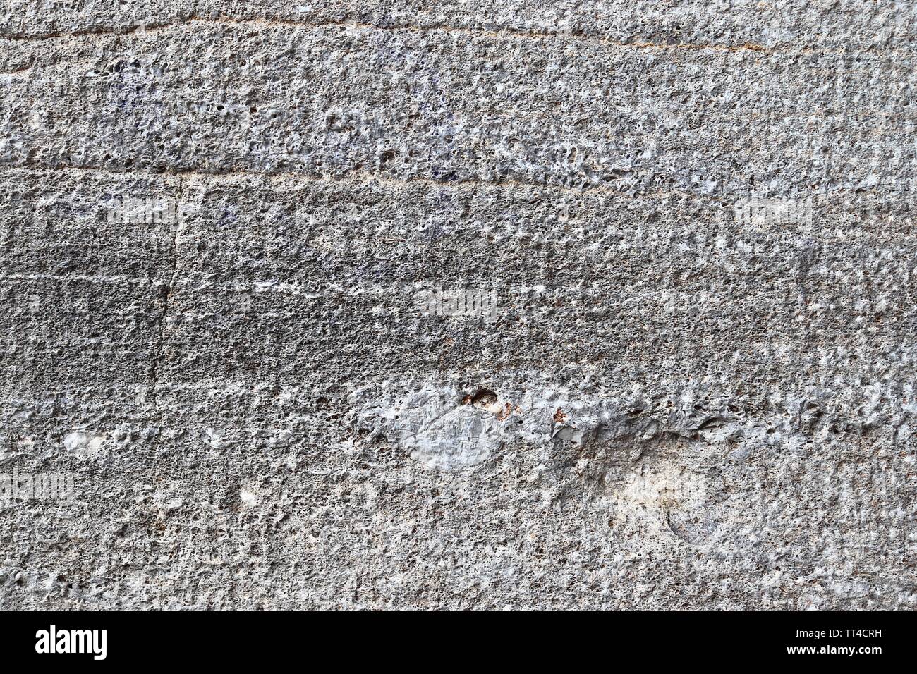 Detailed close up of a structured concrete wall with some cracks Stock ...