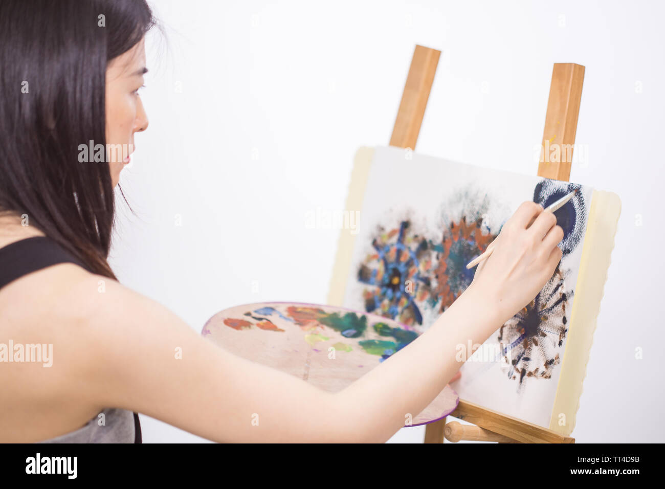 Female asian painter brush hi-res stock photography and images - Alamy
