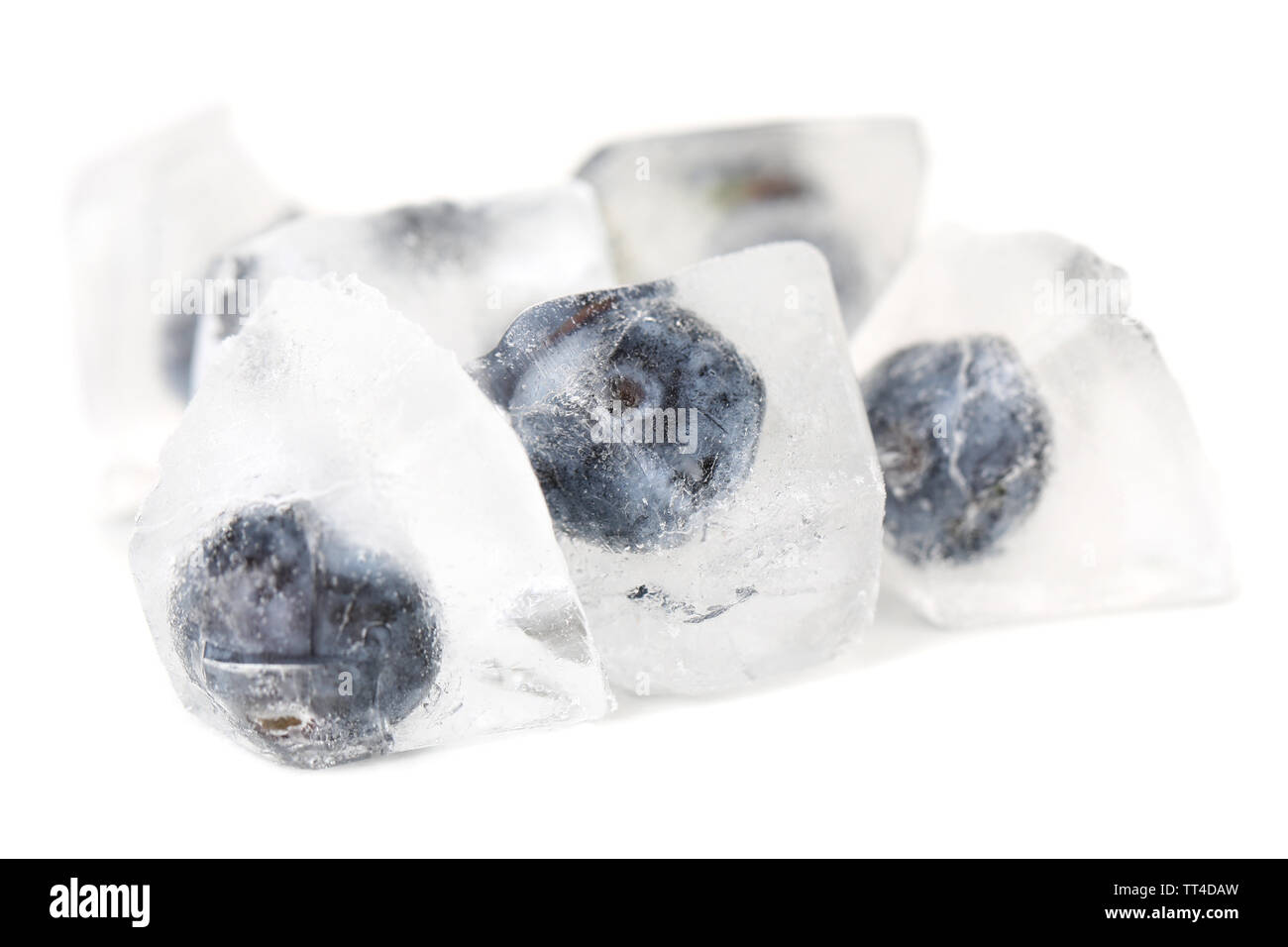 Ice cubes with blueberry, isolated on white Stock Photo - Alamy