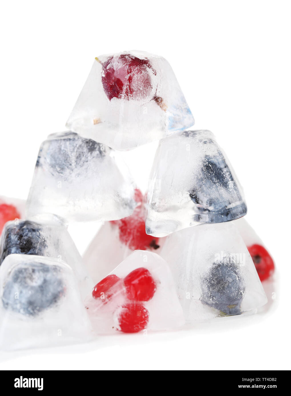Ice cubes with forest berries, isolated on white Stock Photo - Alamy