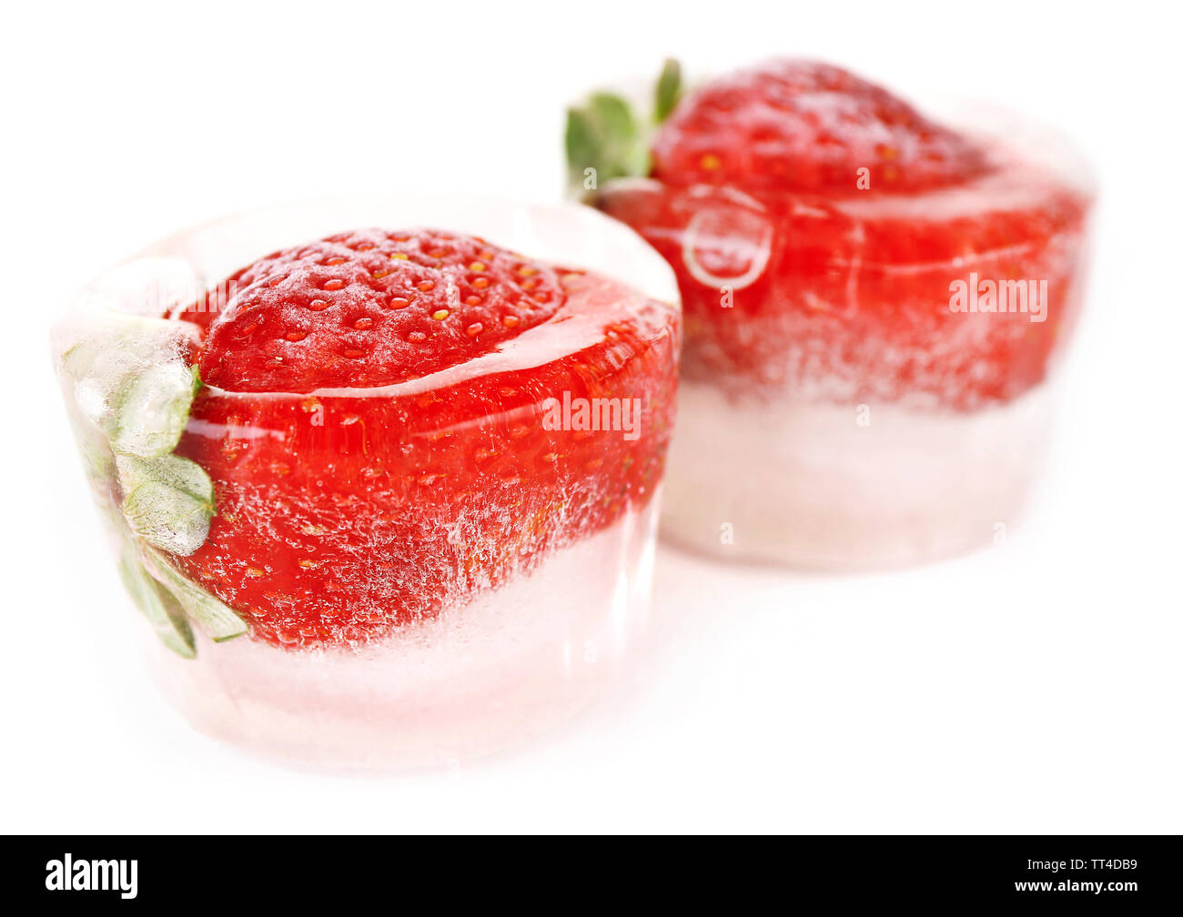 Ice cubes with strawberry isolated on white Stock Photo - Alamy