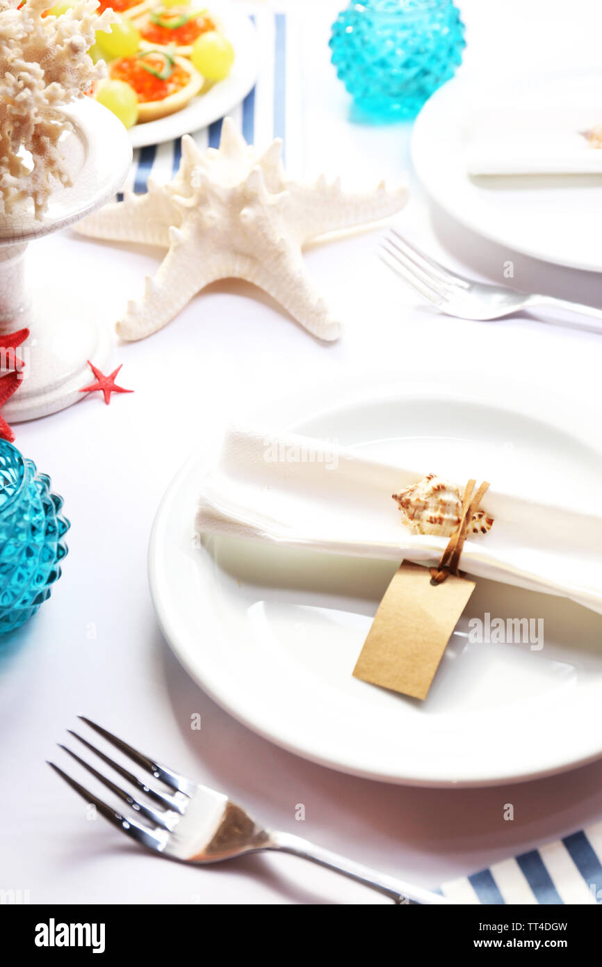 Restaurant table setting in sea theme Stock Photo - Alamy