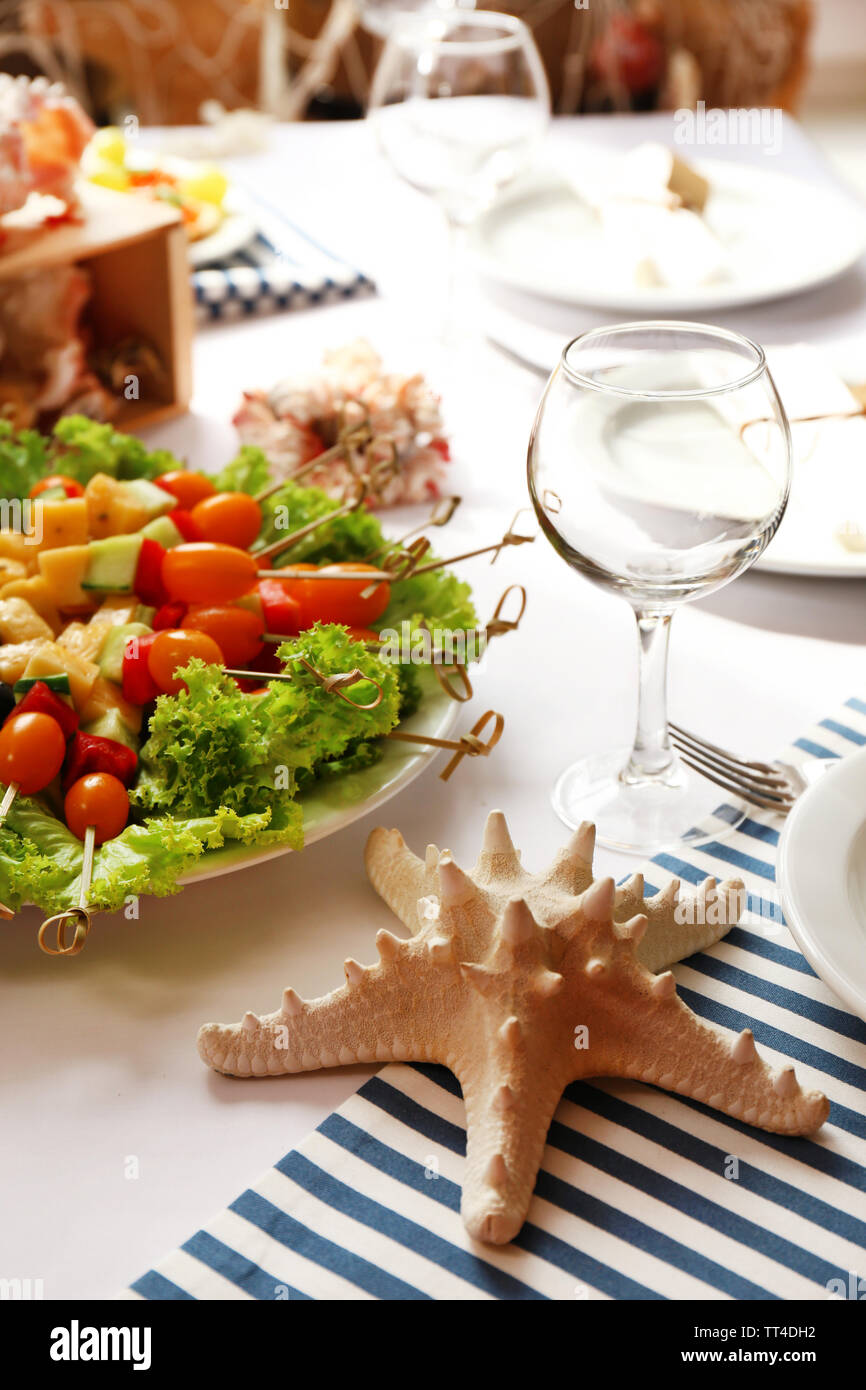Restaurant table setting in sea theme Stock Photo - Alamy