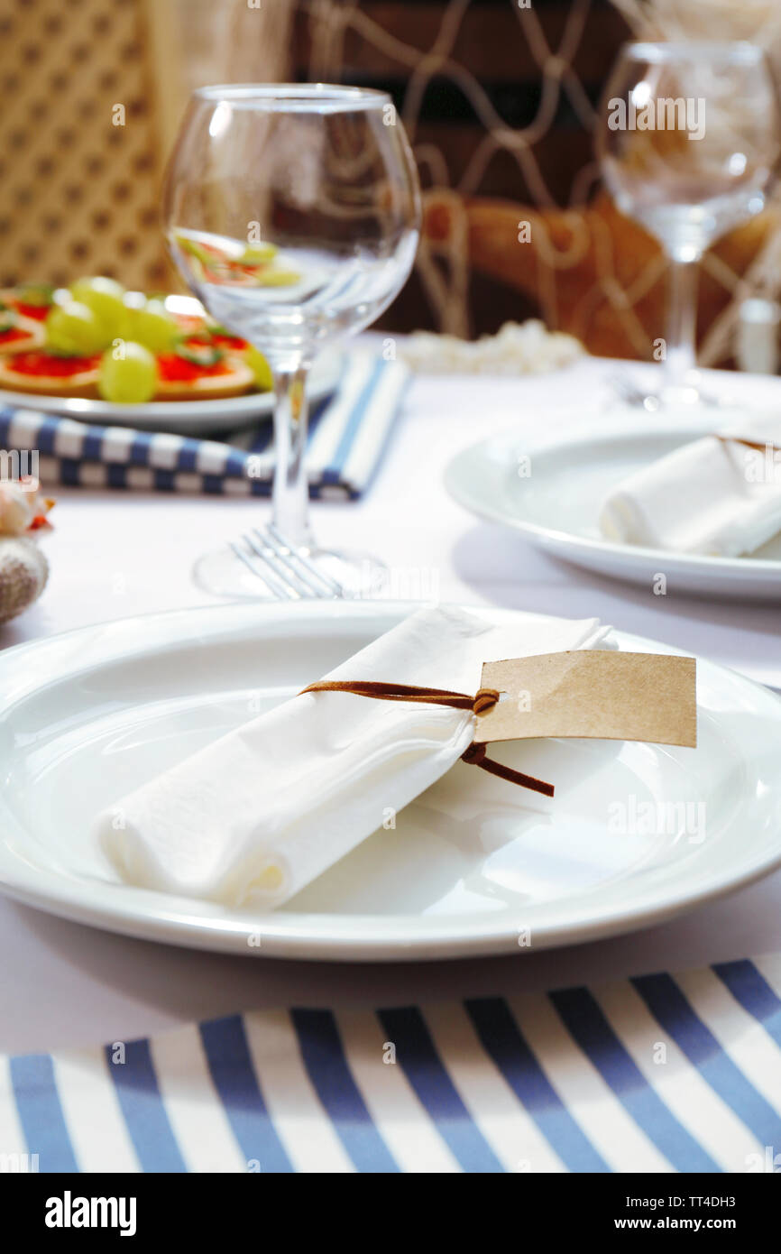 Restaurant table setting in sea theme Stock Photo - Alamy