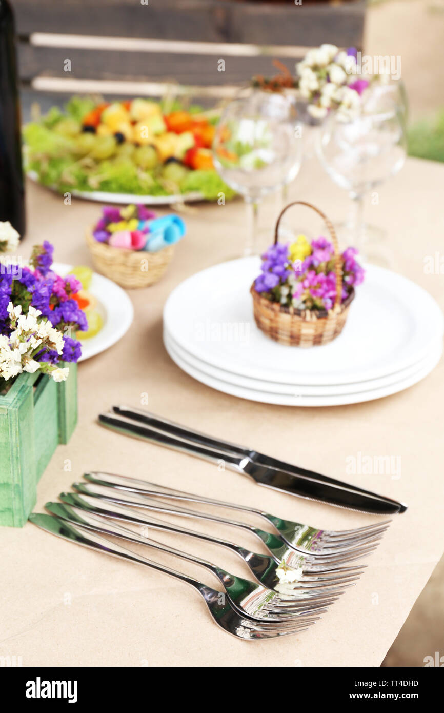 Buffet table with dishware waiting for guests Stock Photo - Alamy