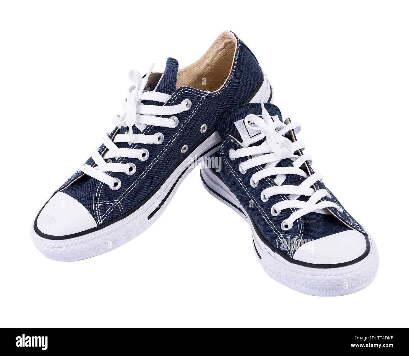 Classic white sneakers isolated on white background Stock Photo - Alamy