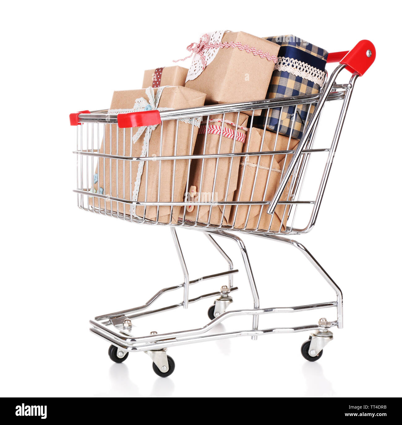 Many present boxes in shopping cart isolated on white Stock Photo - Alamy