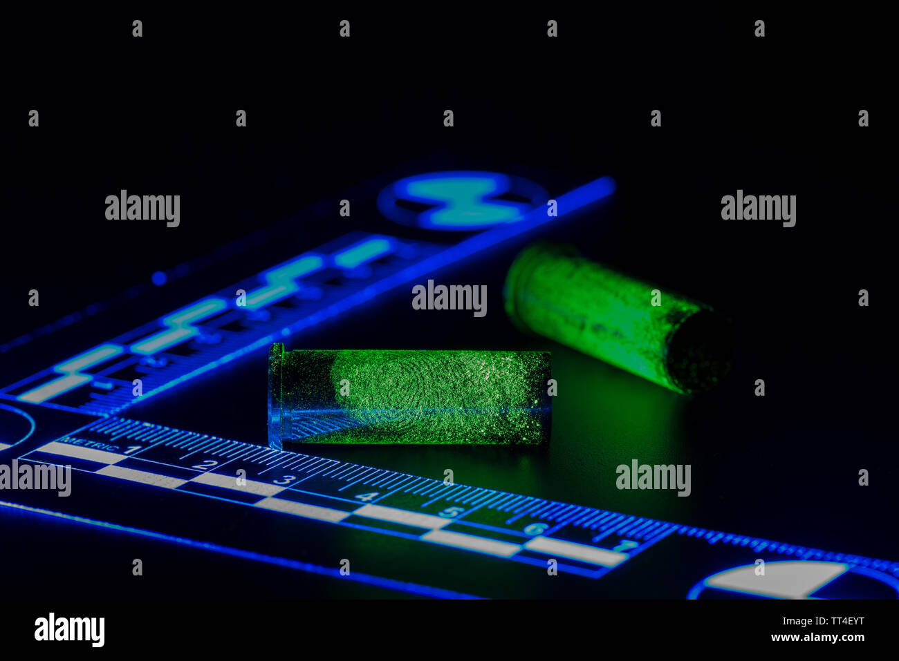 Forensic fluorescent fingerprint evidence on live and dead 0.38 inch ...