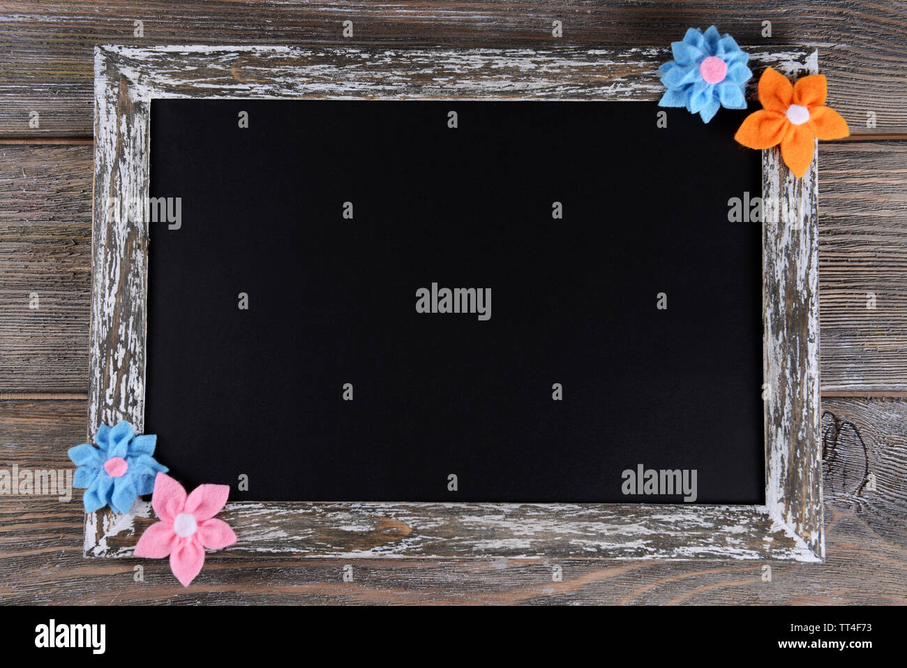 Vintage sign board on wooden background Stock Photo - Alamy