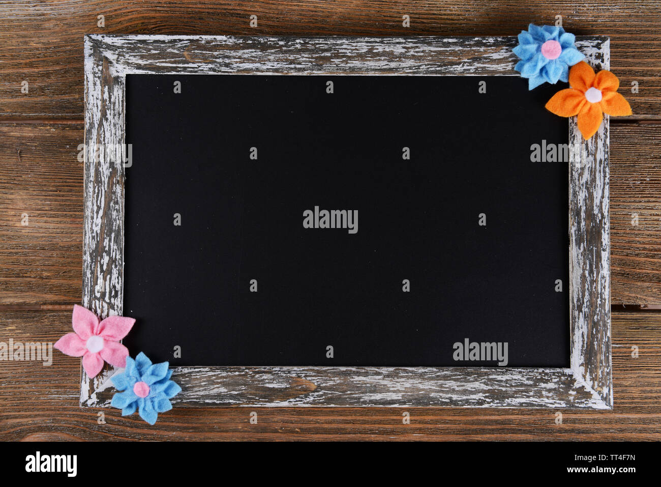 Vintage sign board on wooden background Stock Photo - Alamy