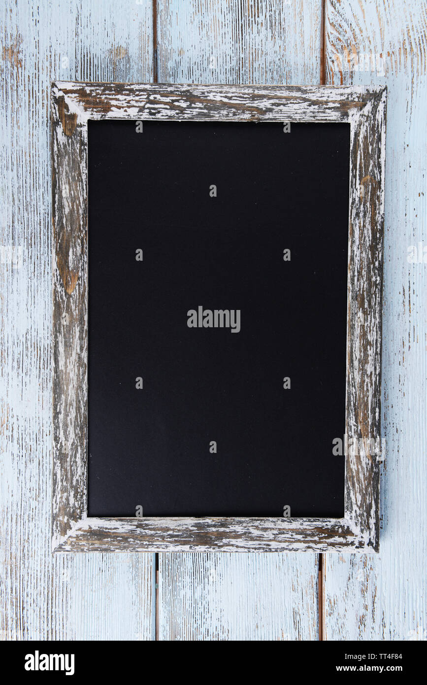 Vintage sign board on wooden background Stock Photo - Alamy