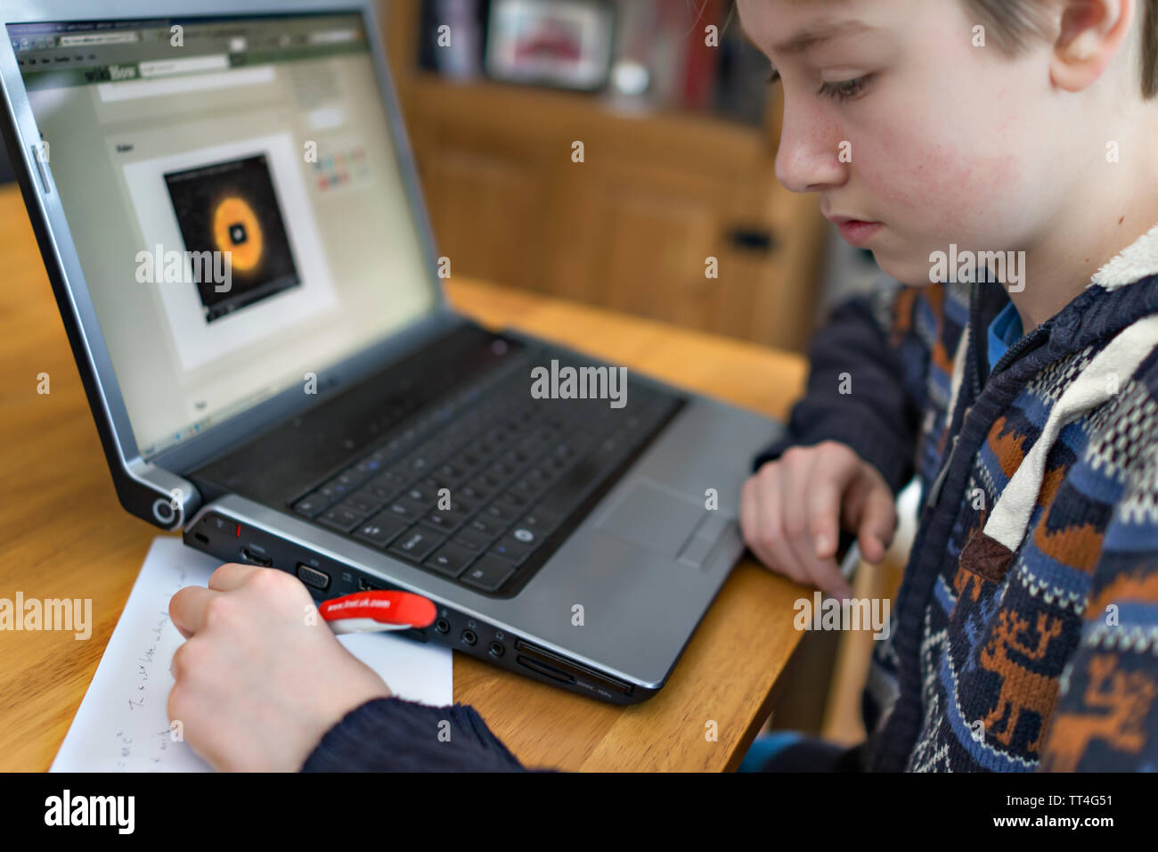 Boy girl doing homework table hi-res stock photography and images - Alamy