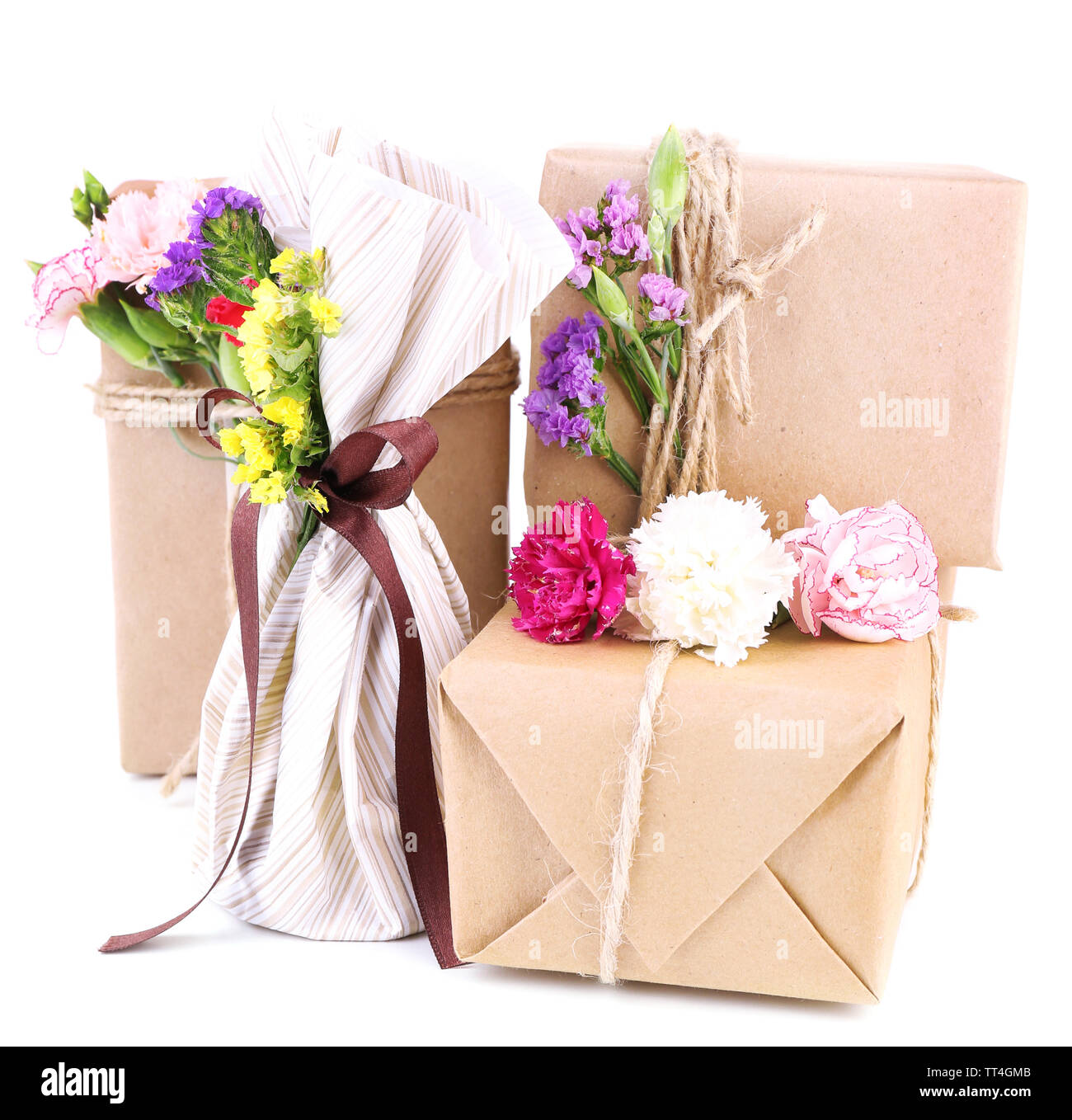 Beautiful gifts with flowers, isolated on white Stock Photo - Alamy