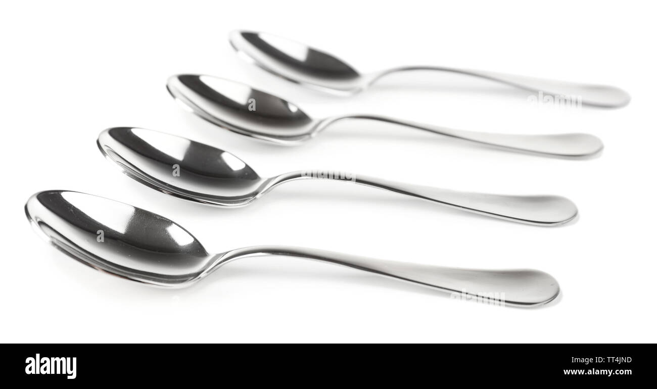 Metal tea spoon isolated on white Stock Photo - Alamy