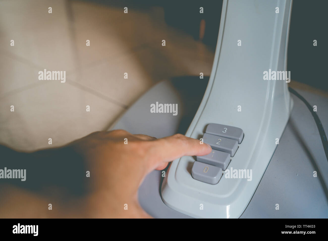 turn on switch electric fan with hand Stock Photo - Alamy