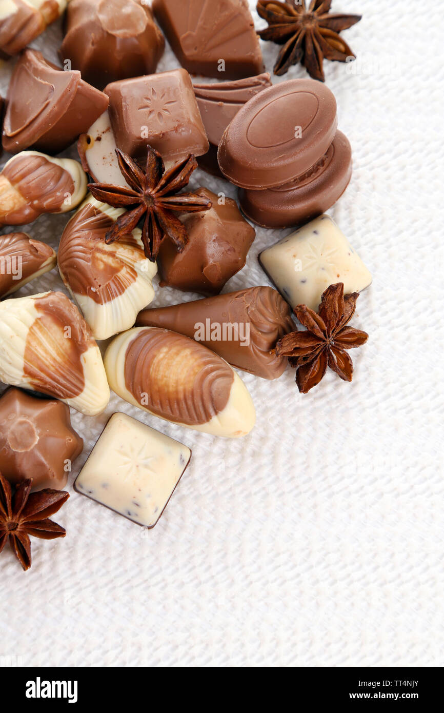 Different kinds of chocolates with spices on white background Stock ...