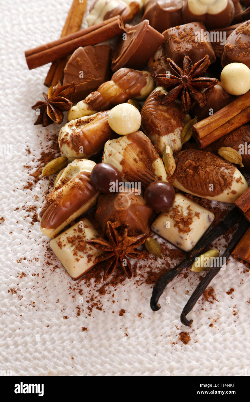 Different kinds of chocolates with spices on white background Stock ...