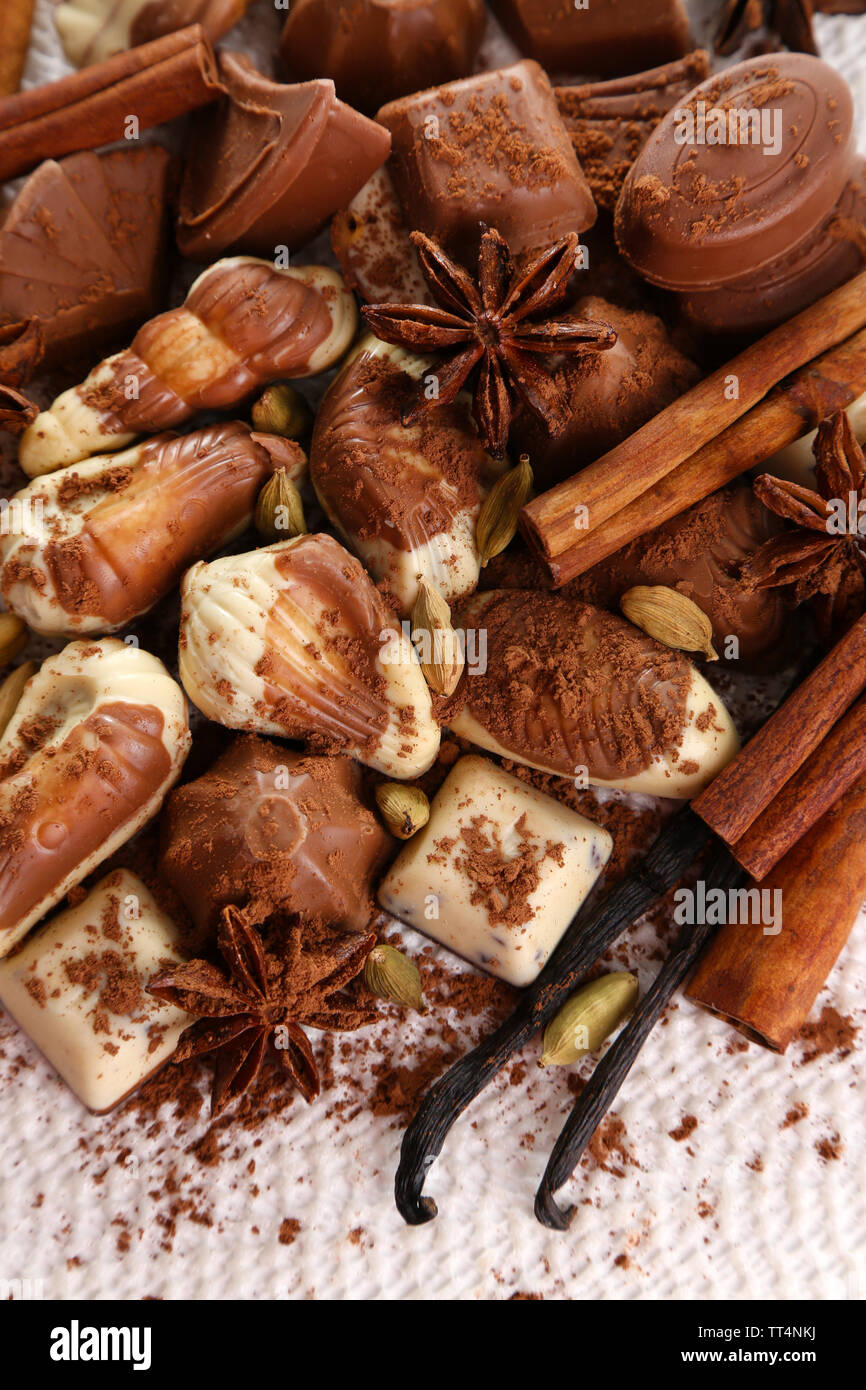 Different kinds of chocolates with spices on white background Stock ...