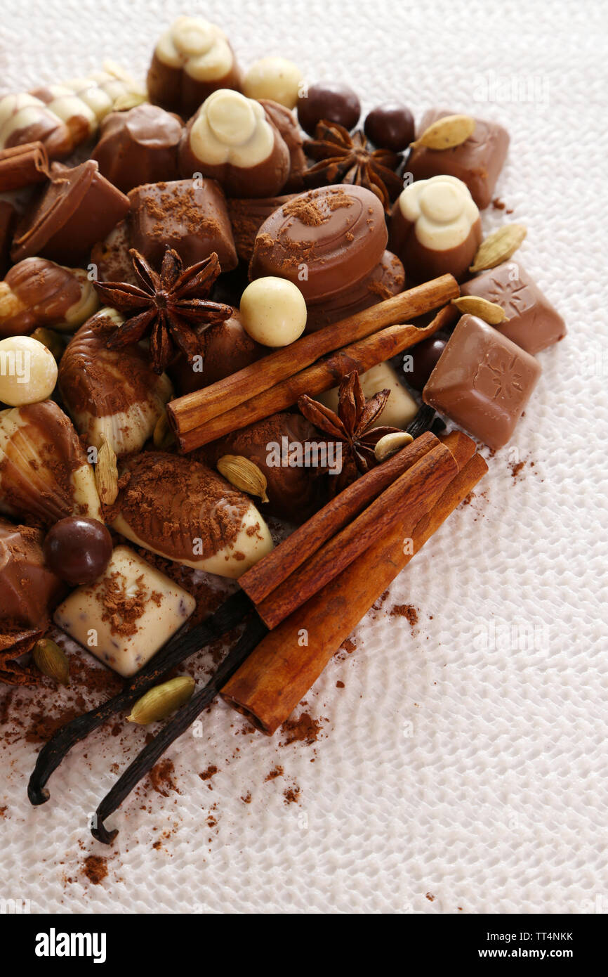 Different kinds of chocolates with spices on white background Stock ...