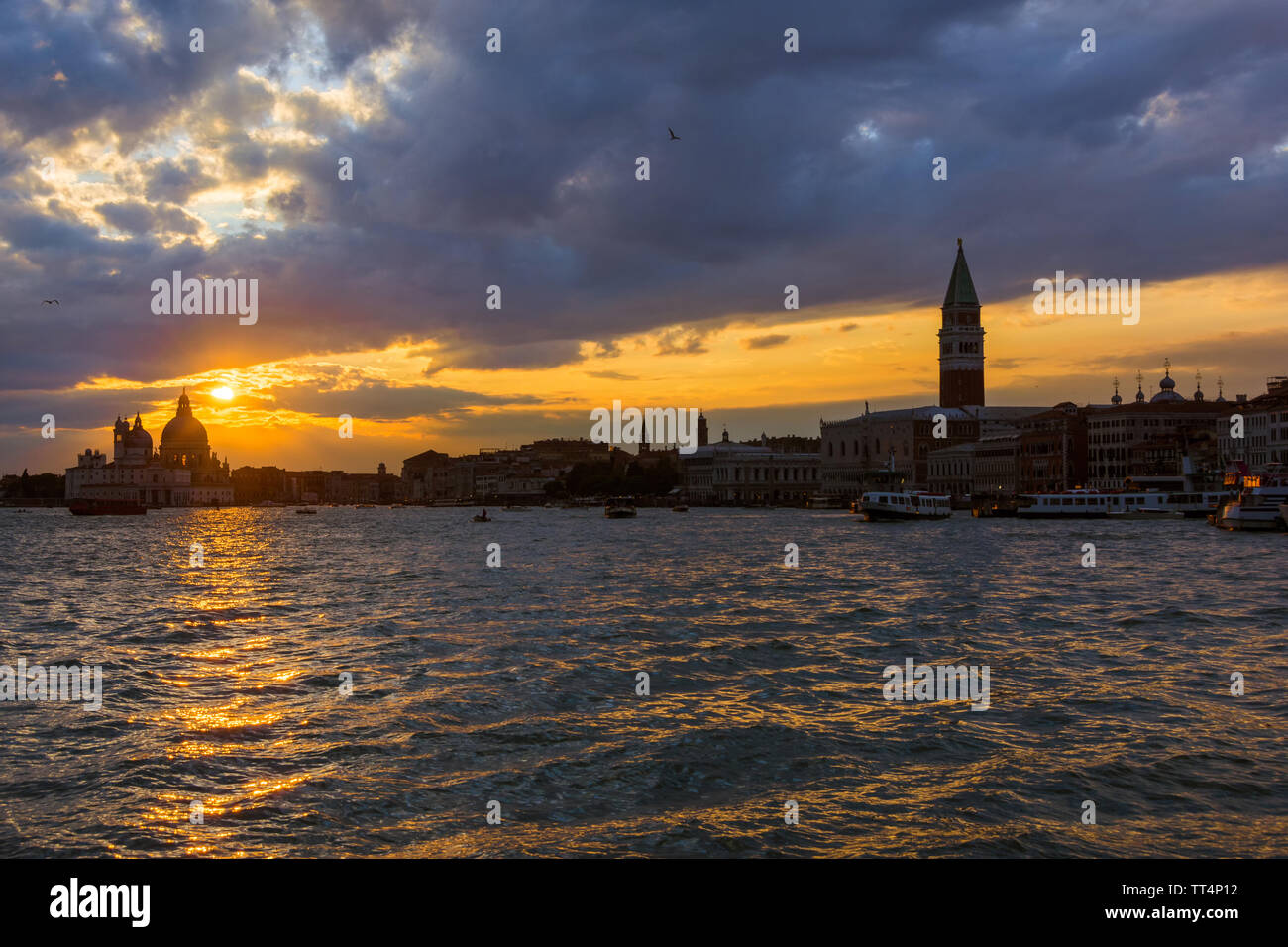 Beautiful sunset over Venice Lagoon ancient monuments Stock Photo - Alamy