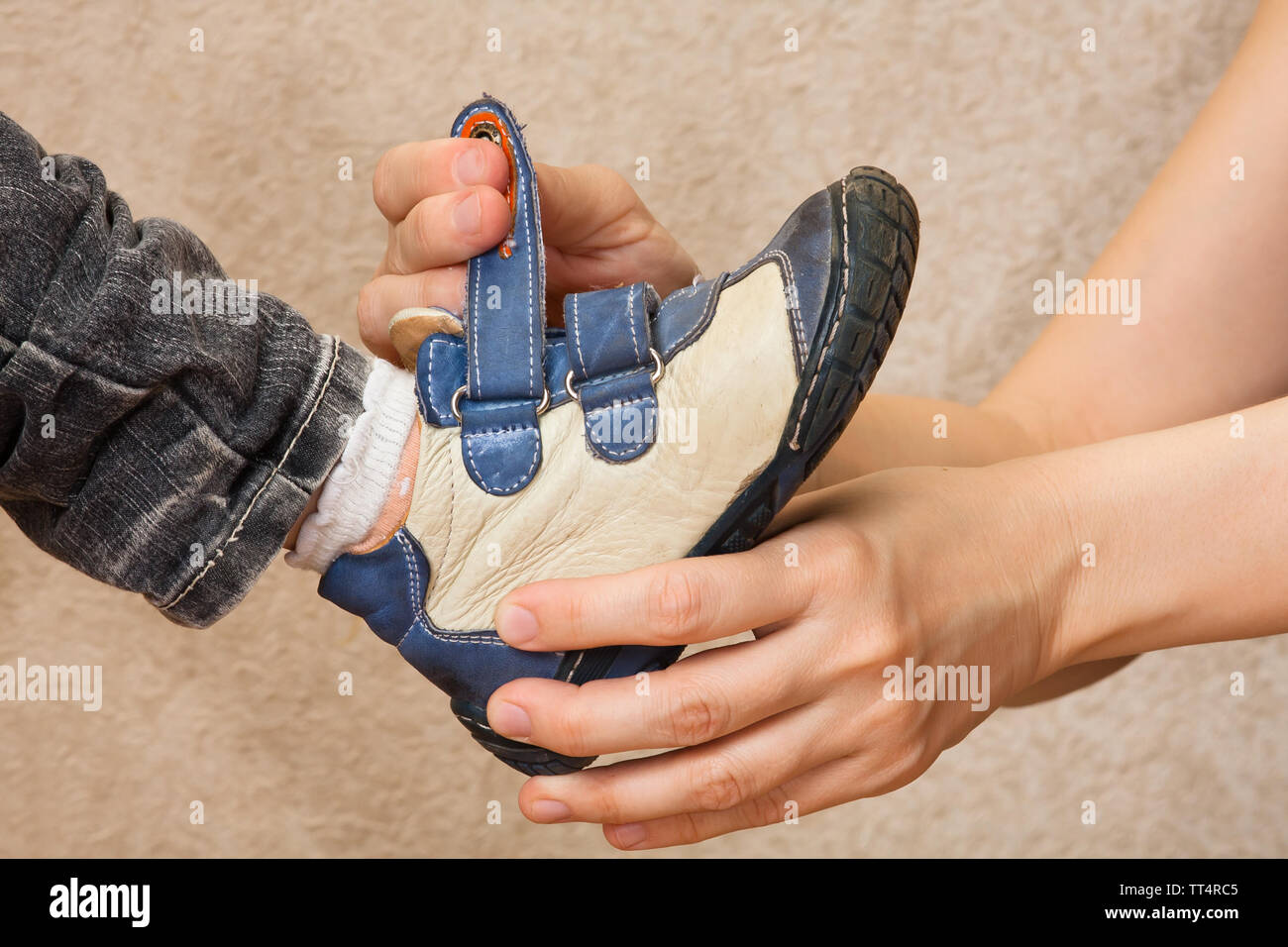 Child helping mother hi-res stock photography and images - Alamy