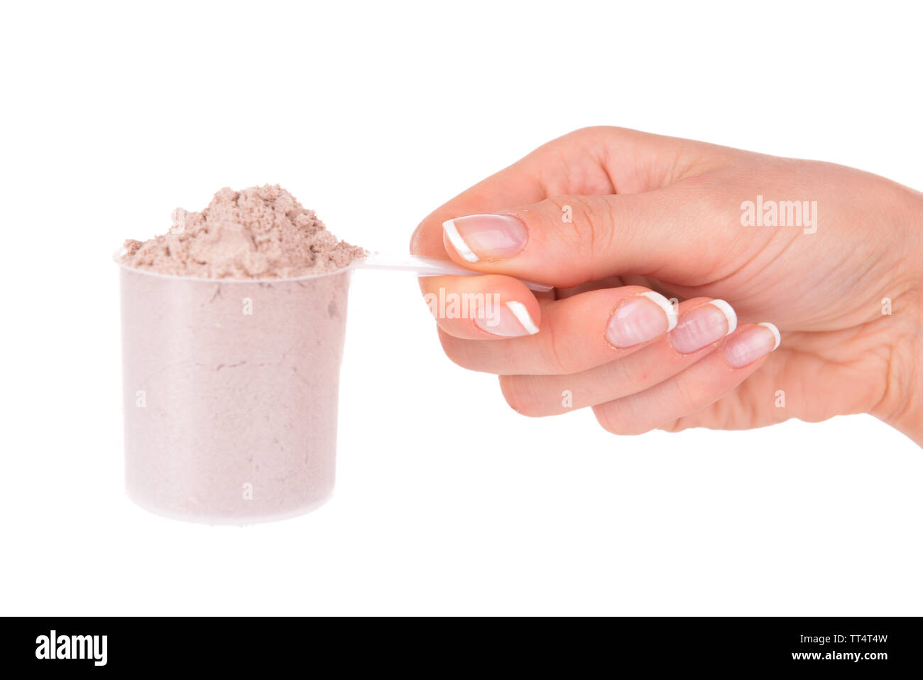 Female hand holding scoop with whey protein powder isolated on white ...