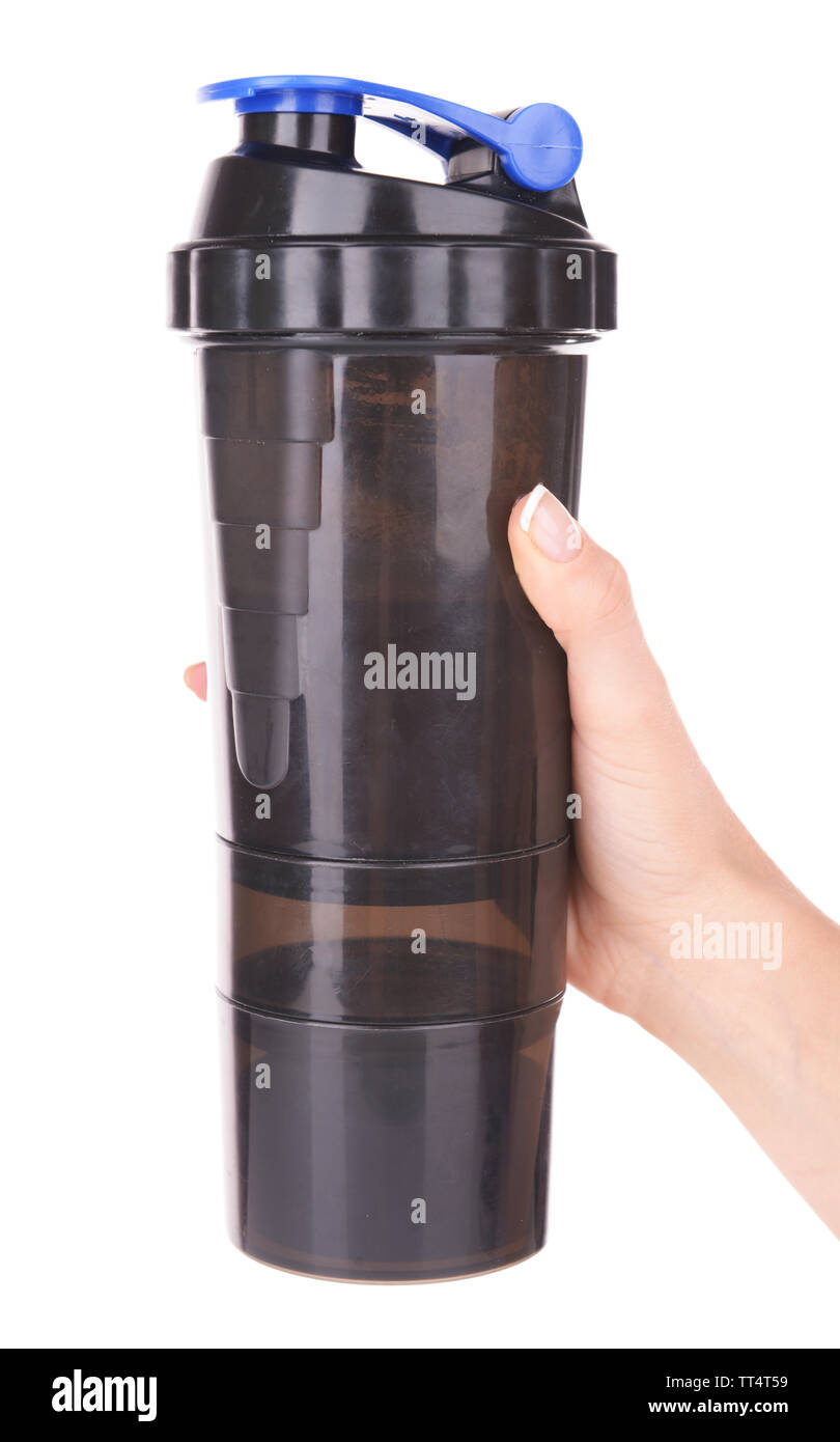 Female hand holding plastic shaker with protein shake isolated on white ...