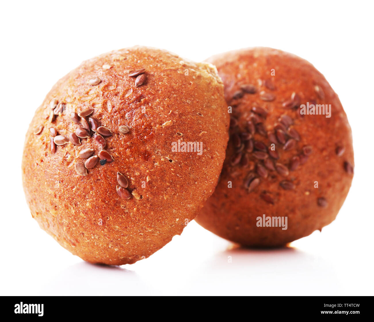 Tasty brown buns with sesame isolated on white Stock Photo - Alamy