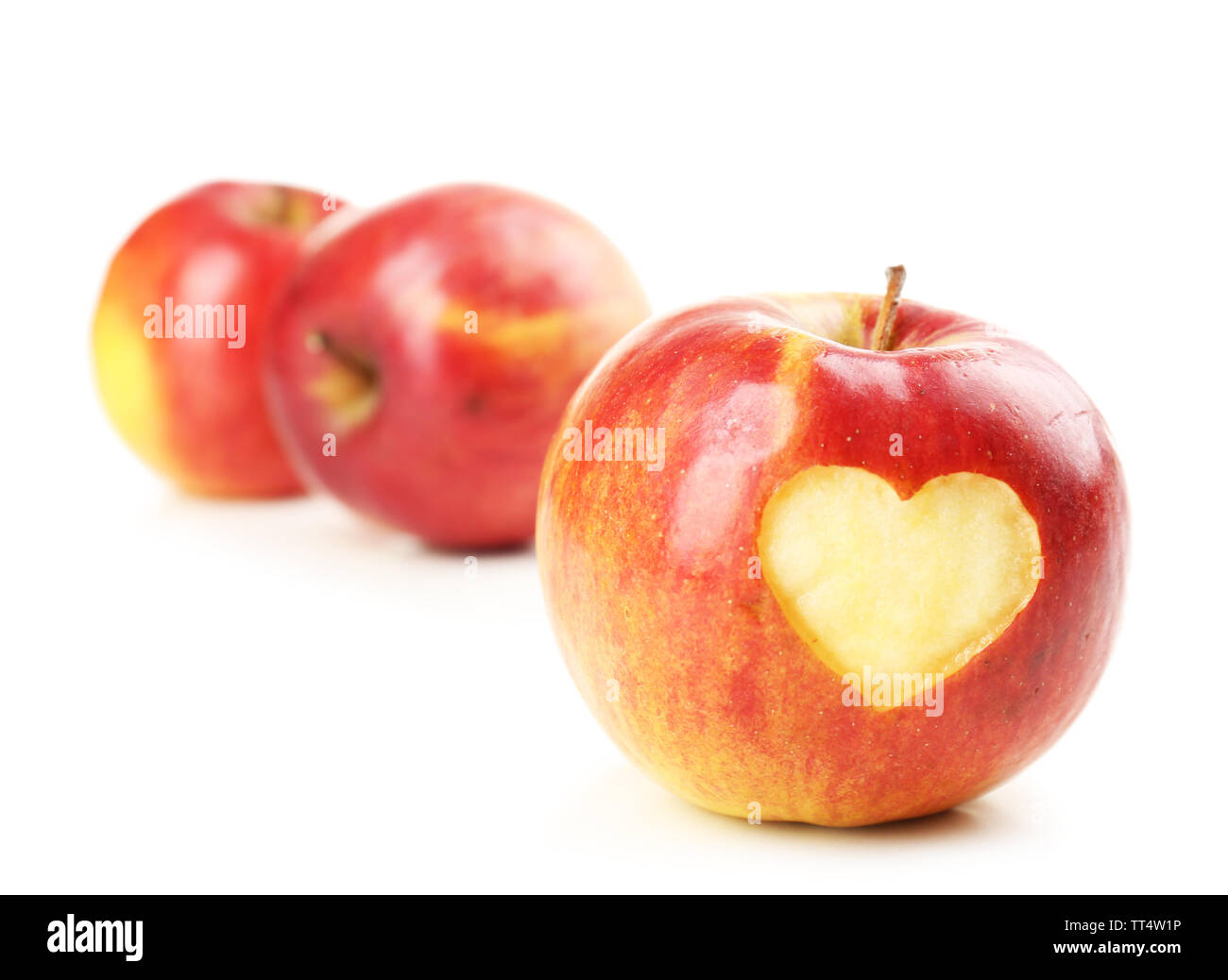 Red apple with heart isolated on white Stock Photo - Alamy