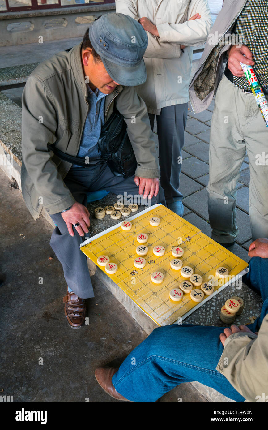 People playing Xiangqi, also called Chinese chess, Green Lake Park ...