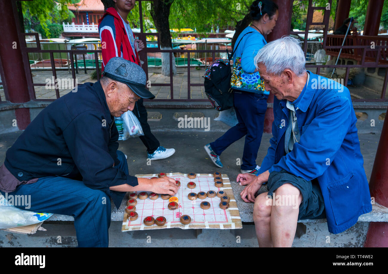 People playing Xiangqi, also called Chinese chess, Green Lake Park ...