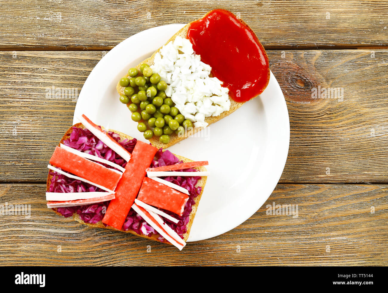 Sandwiches with different flags on table close-up Stock Photo - Alamy