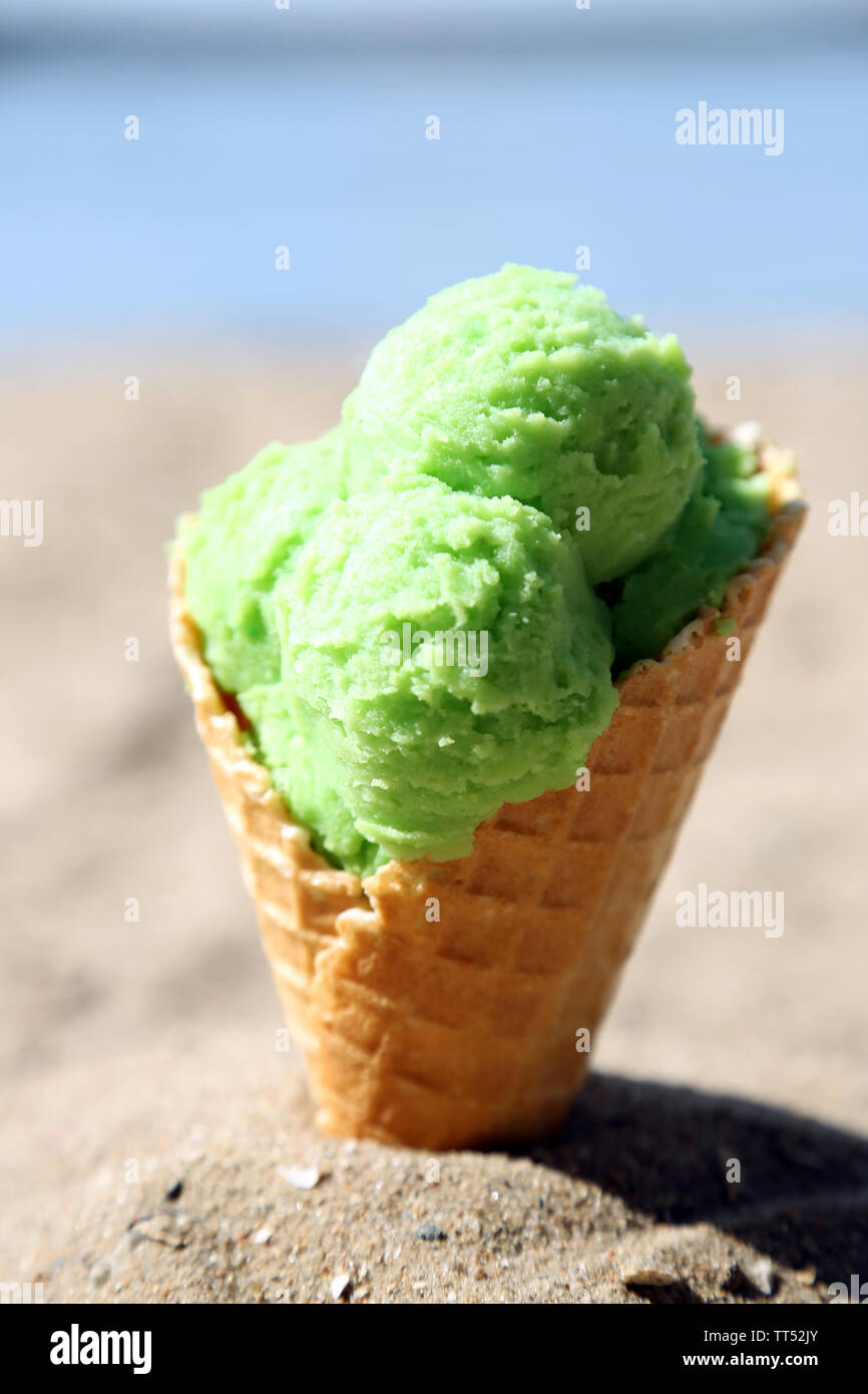 Ice cream in sand on beach Stock Photo - Alamy
