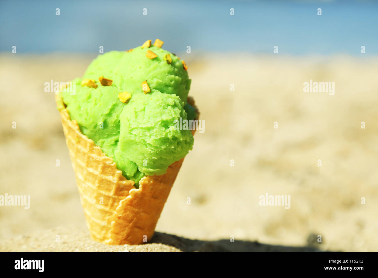 Ice cream in sand on beach Stock Photo - Alamy