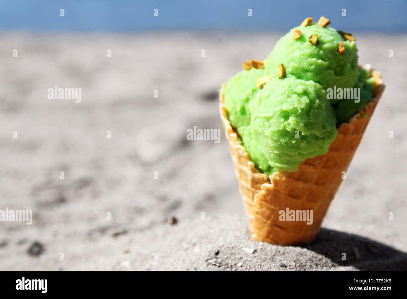 Ice cream in sand on beach Stock Photo - Alamy